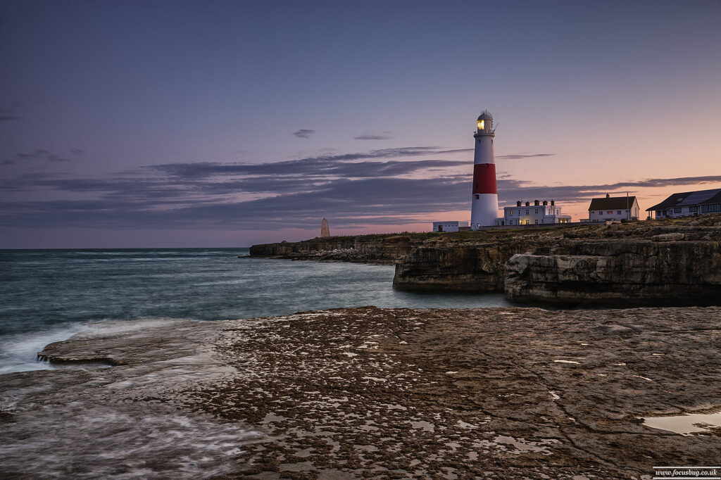 FocusBug - Portland Bill lighthouse at sunset, Dorset, UK