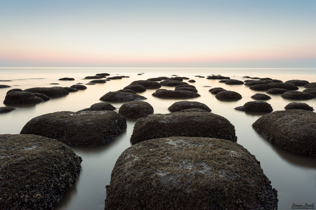 Hunstanton beach rocks. - FocusBug